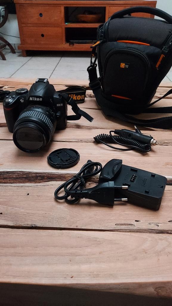 ② Nikon D3000 met lens + tas — Fotocamera's Digitaal — 2dehands